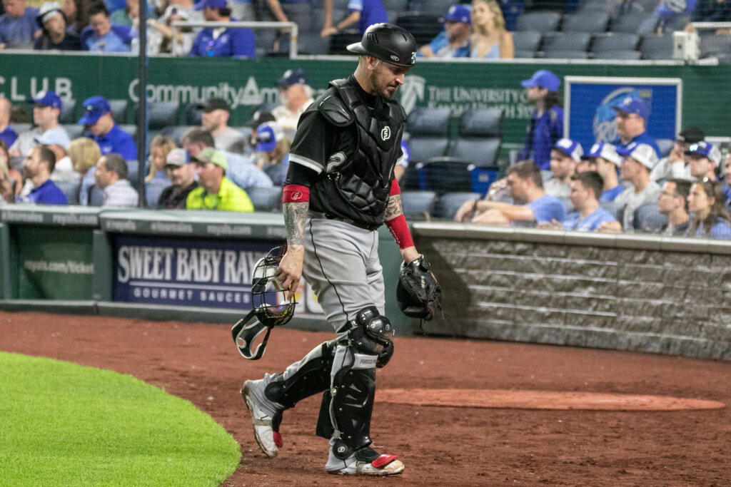 What Pros Wear: Yasmani Grandal's Rawlings Coolflo Base Coach Helmet ...